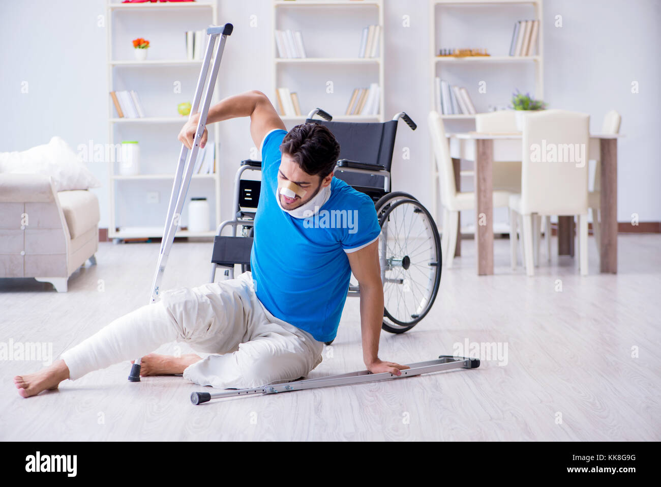 Injured young man recovering at home Stock Photo - Alamy