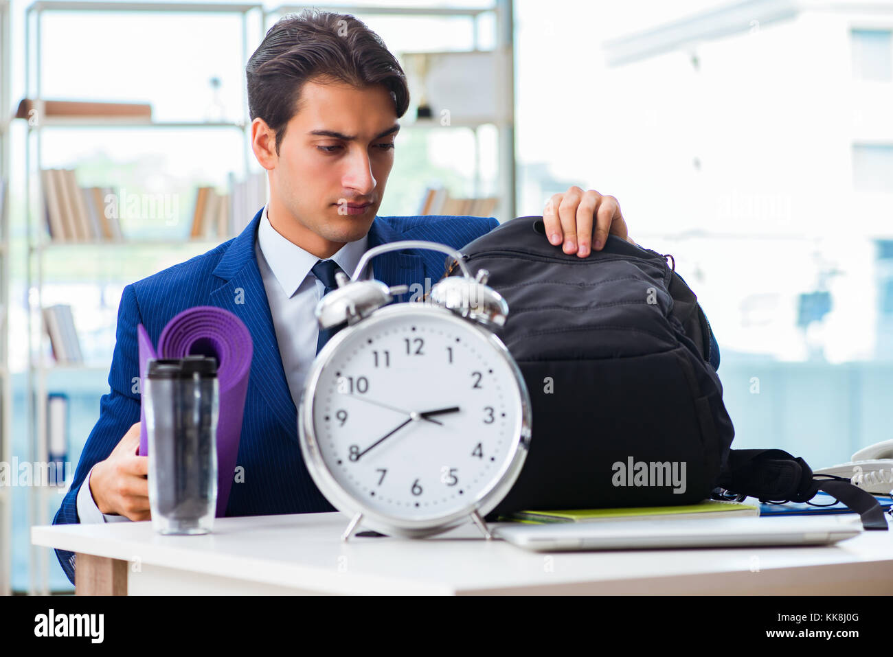 Man getting ready for sports break in the office Stock Photo - Alamy