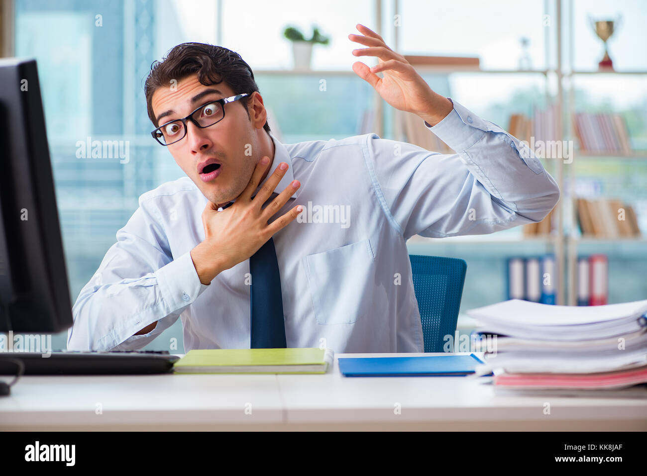 Businessman suffering from excessive armpit sweating Stock Photo - Alamy