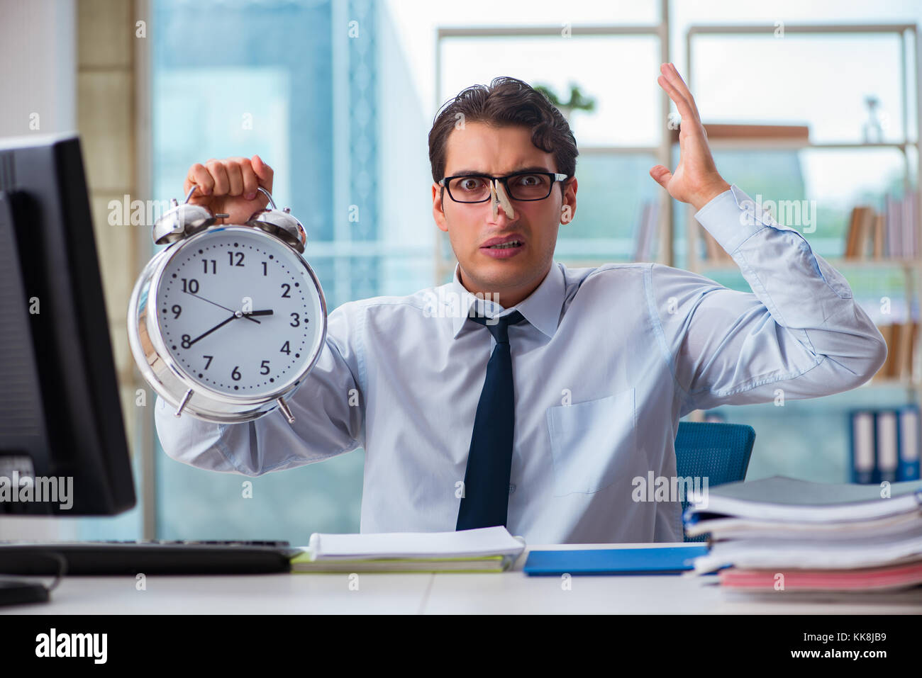 Businessman suffering from excessive armpit sweating Stock Photo - Alamy