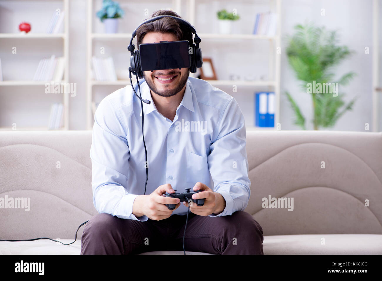 Student gamer playing games at home Stock Photo - Alamy