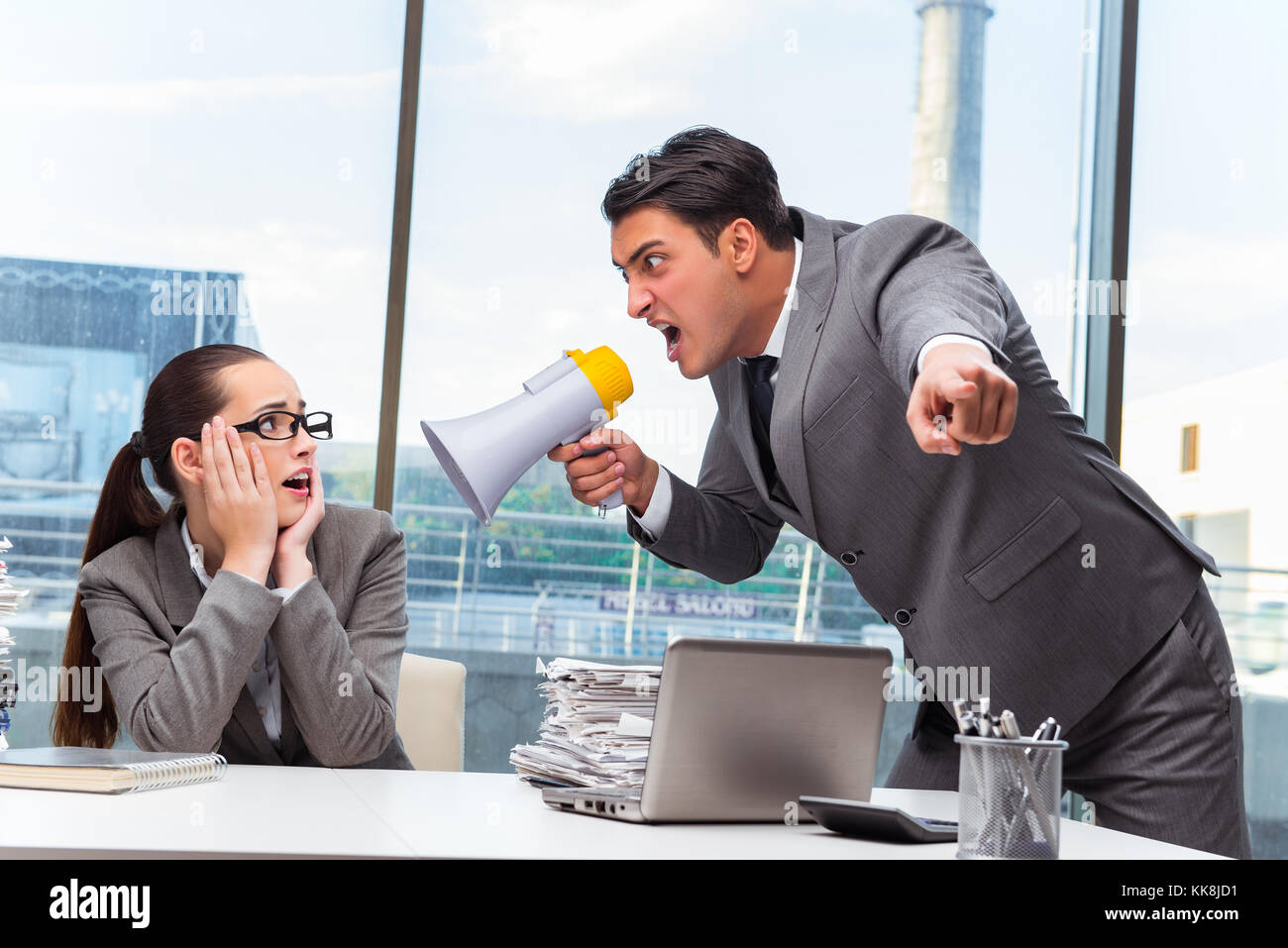 Boss yelling at his team member Stock Photo - Alamy