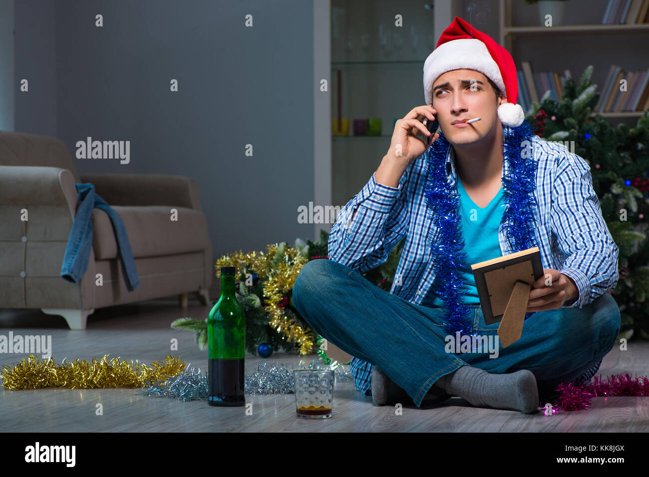 Man celebrating christmas at home alone Stock Photo - Alamy