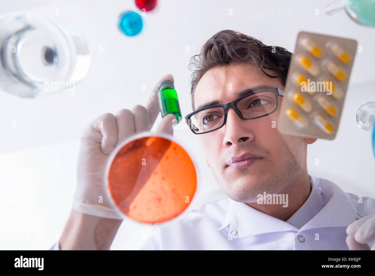 Chemist working in the laboratory with hazardous chemicals Stock Photo ...