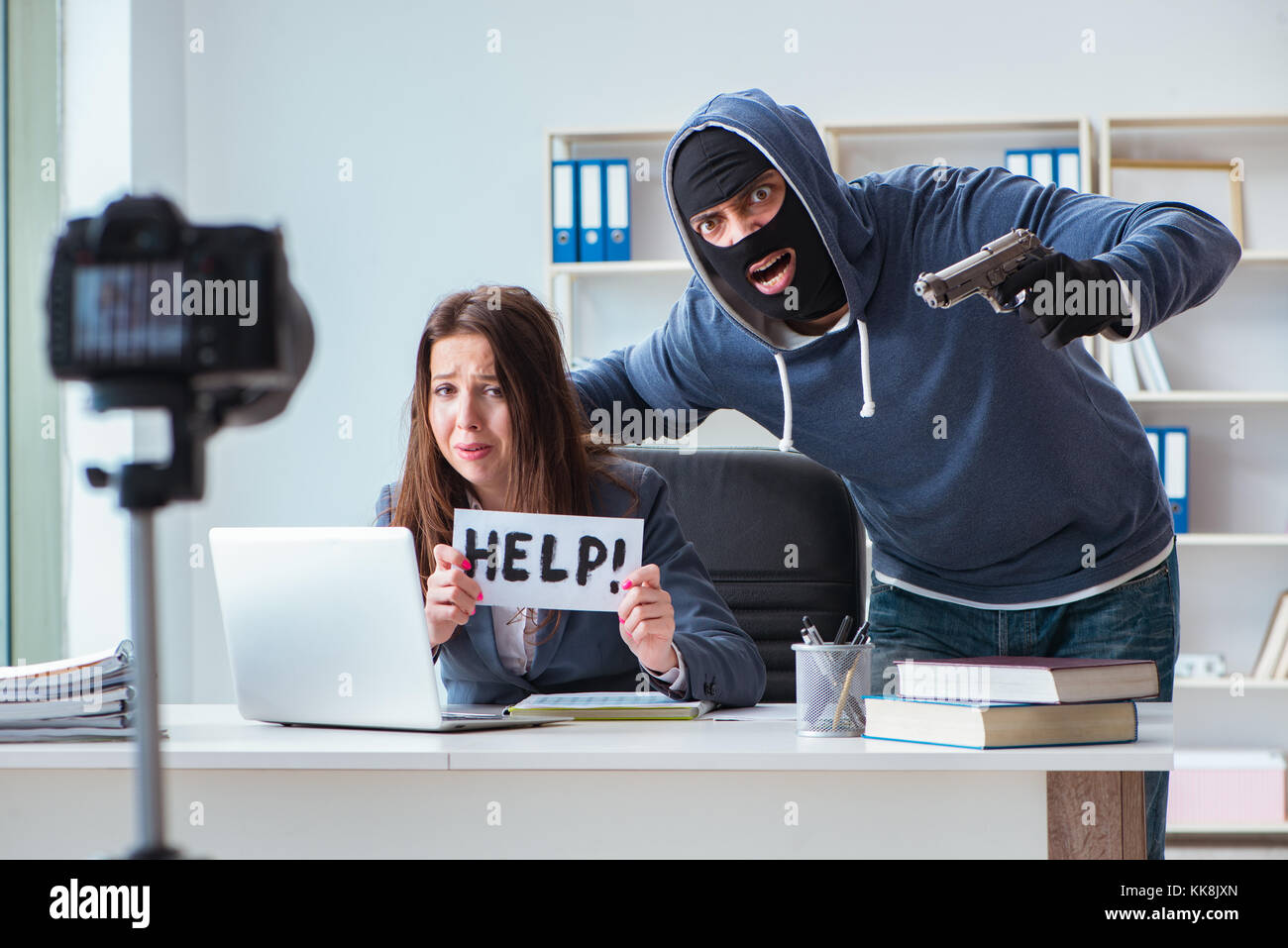 Criminal recording message for ransom with victim businesswoman Stock ...