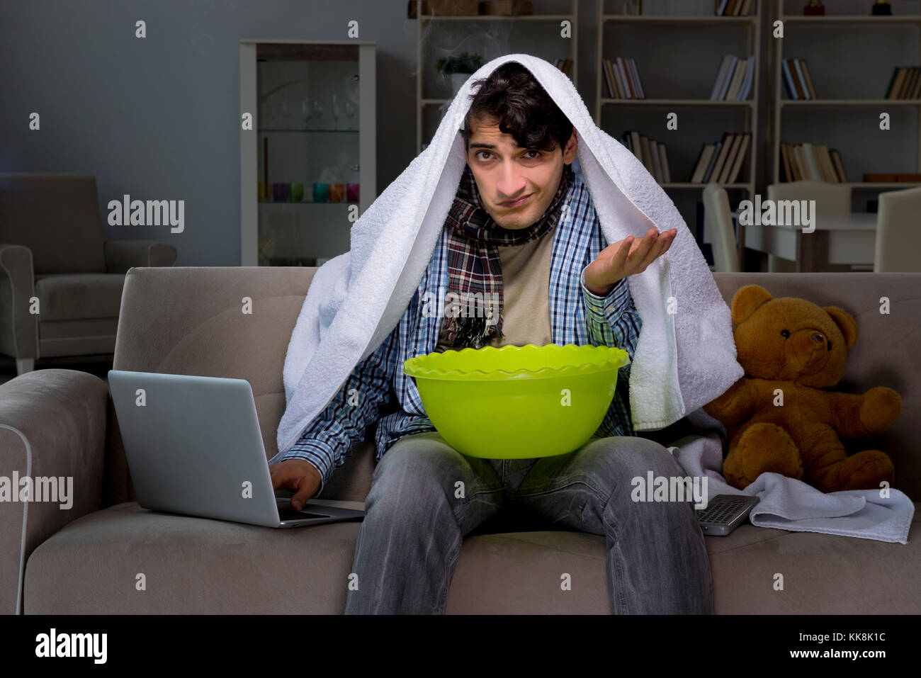 Sick man doing inhalation at night in home Stock Photo - Alamy