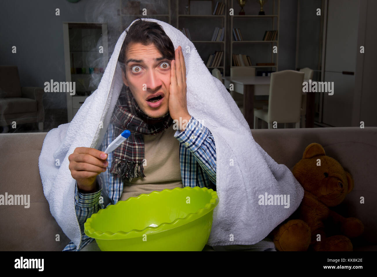 Sick man doing inhalation at night in home Stock Photo - Alamy