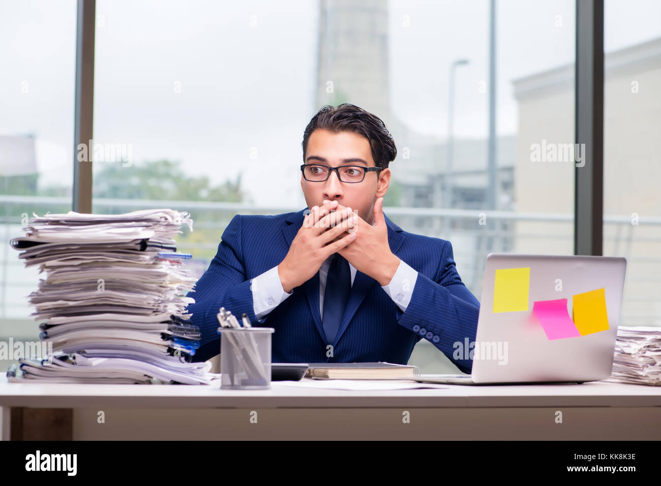 Workaholic businessman overworked with too much work in office Stock ...