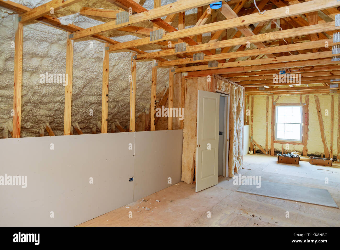 termal insulation installing at the attic insulation of the house Stock ...