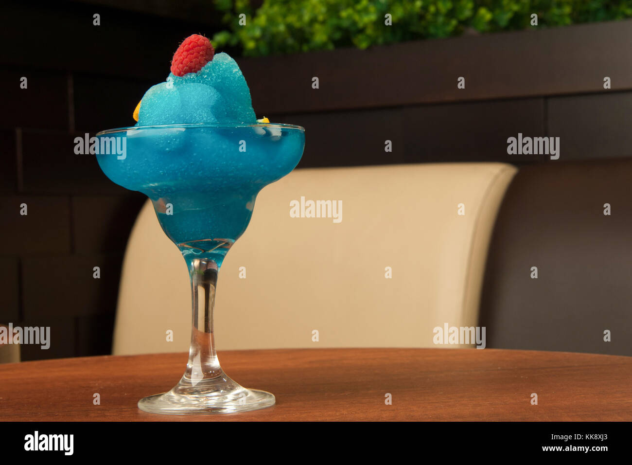 ice cream cup of blue raspberry on the table Stock Photo - Alamy