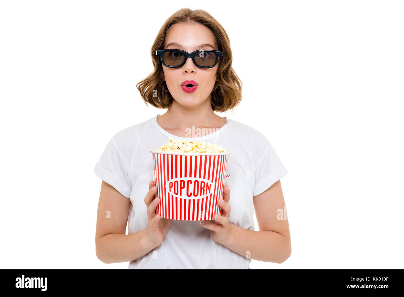 Image of shocked caucasian woman holding pop corn wearing 3d glasses ...