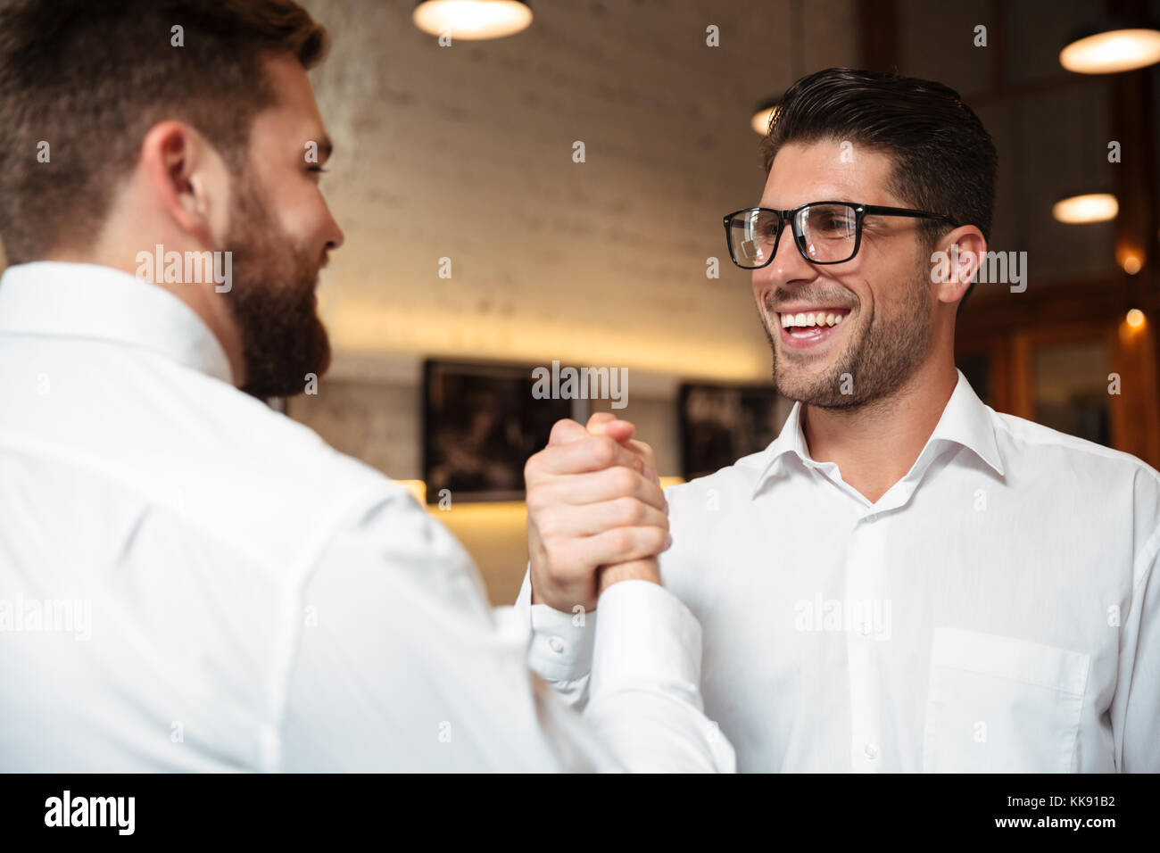 Successful deal portrait happy male hi-res stock photography and images ...