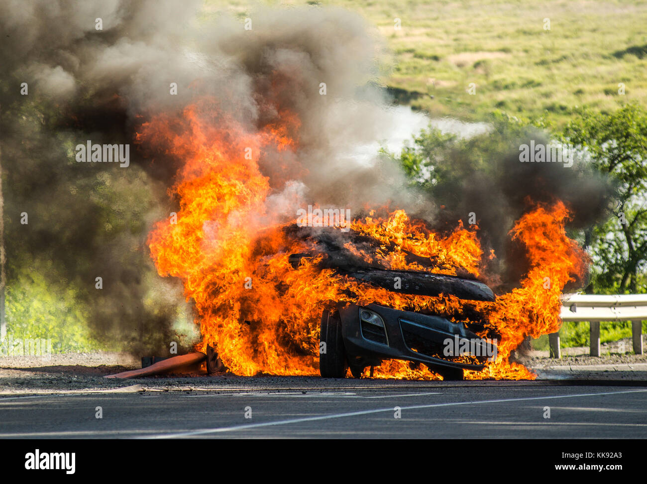 passenger car in a fire Stock Photo - Alamy