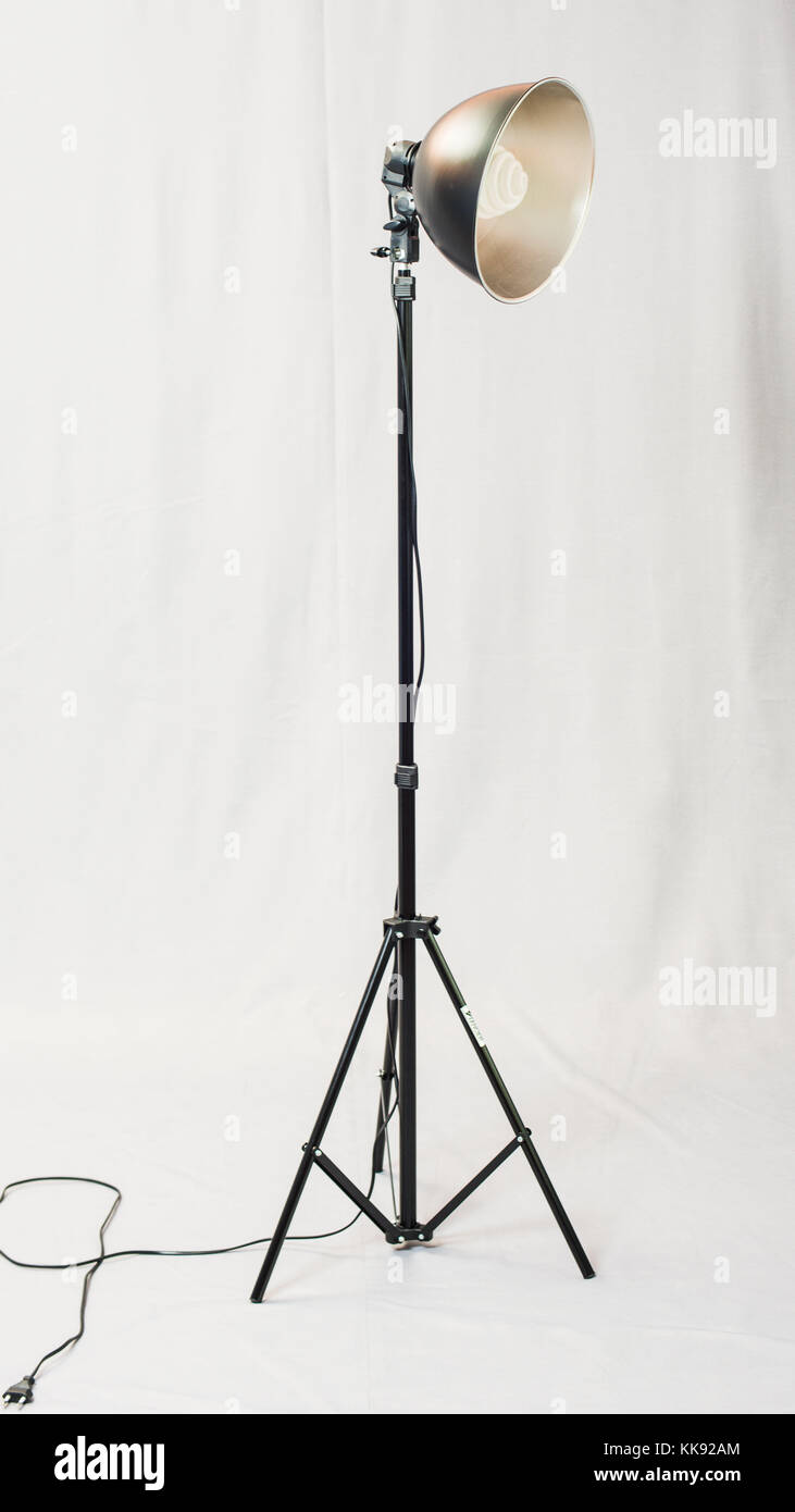 Studio light stand isolated on the white Stock Photo - Alamy