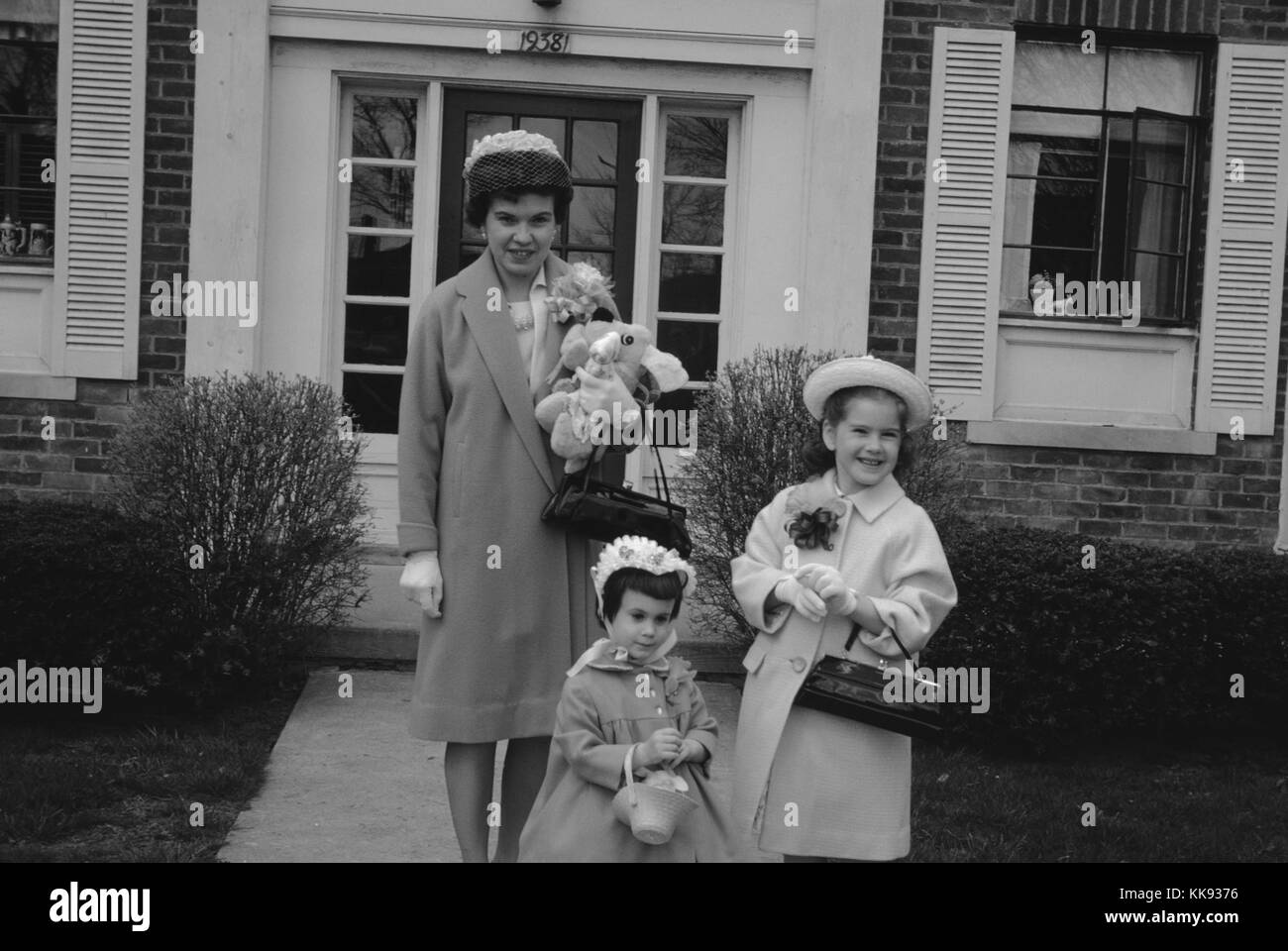 Vernacular snapshot image of family and children with home, 1963 Stock ...