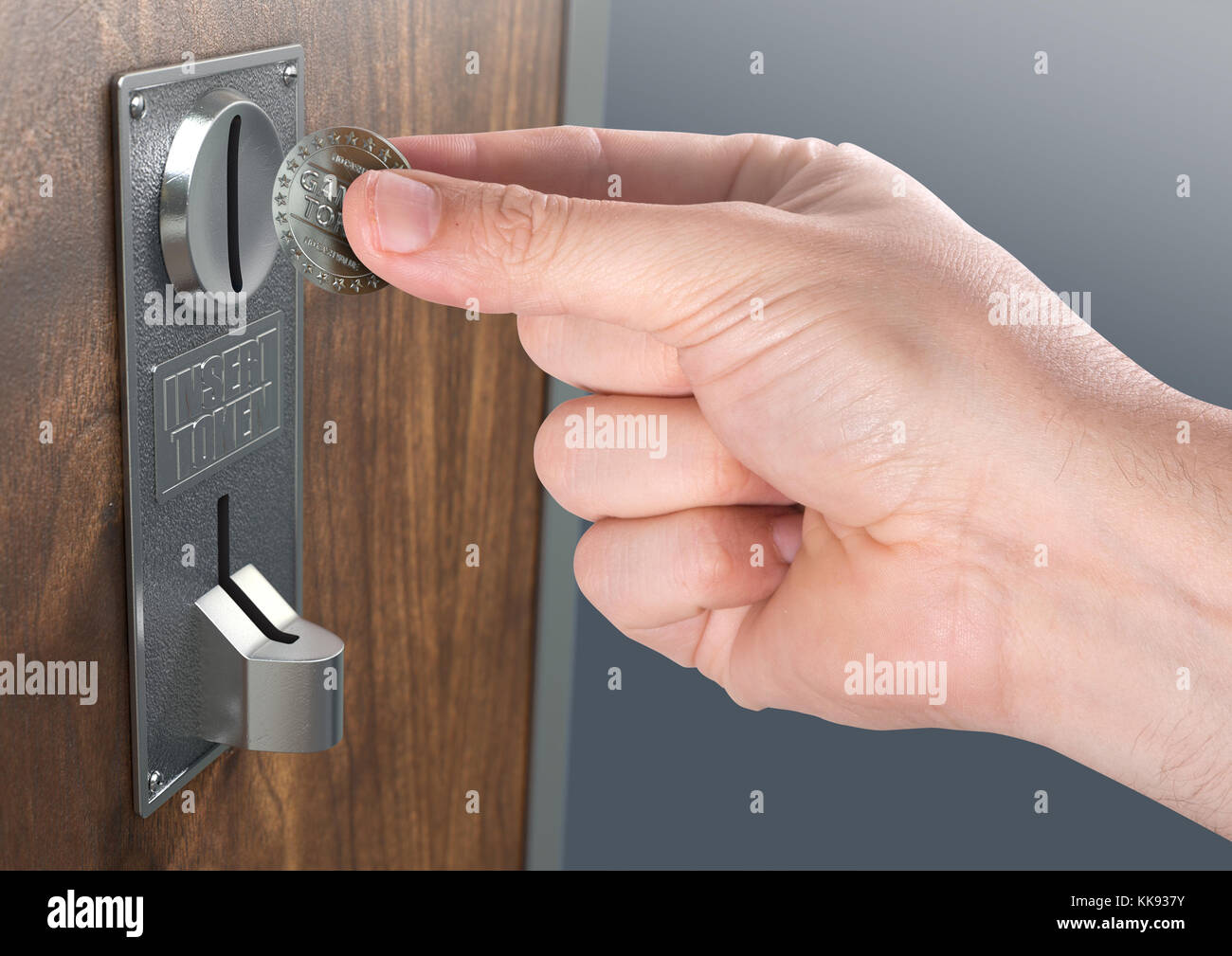 A male hand ready to insert a token into the slot of a vintage chrome ...