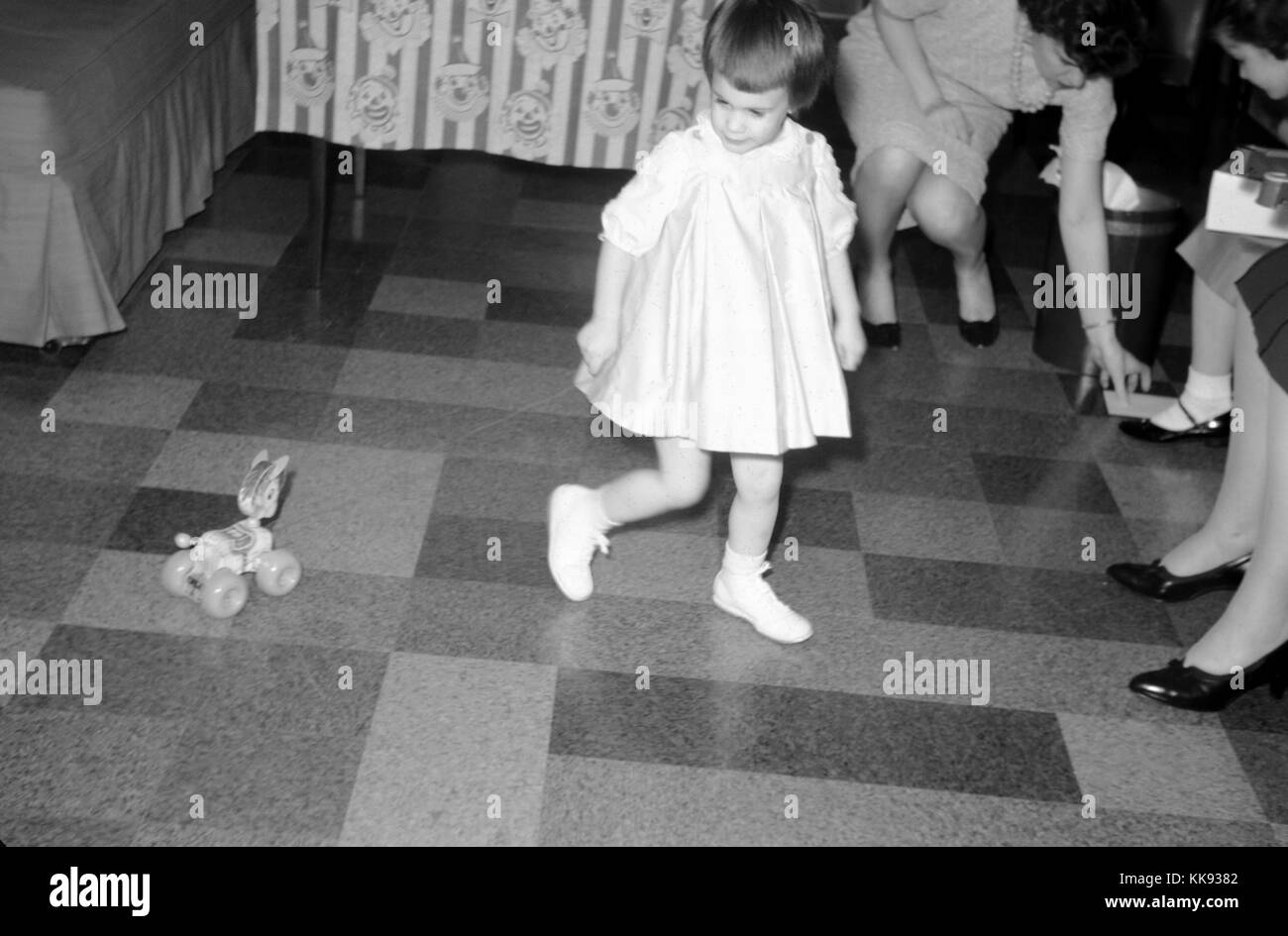 Vernacular snapshot image of girl and party, 1963 Stock Photo - Alamy