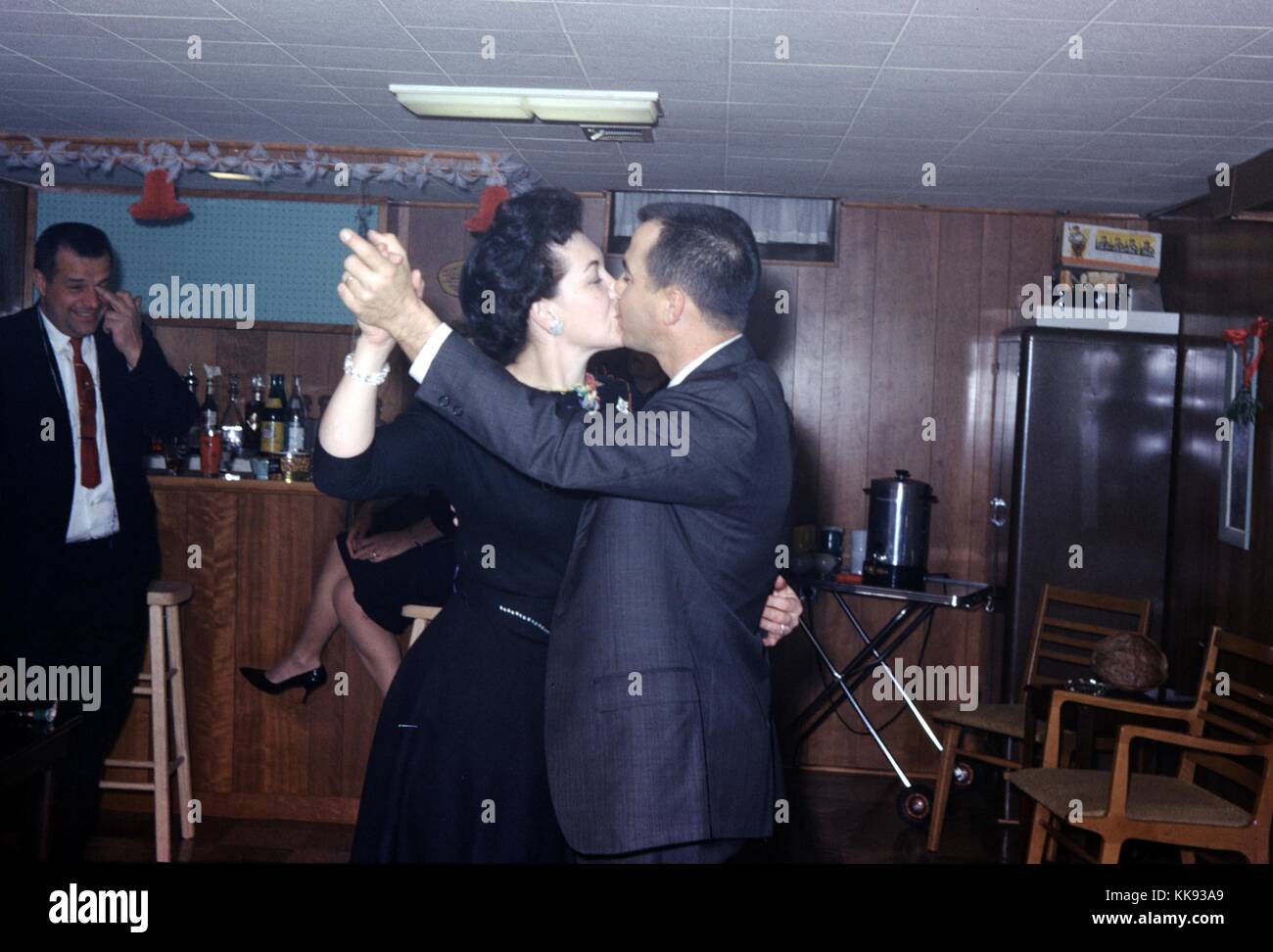 Vernacular snapshot image of couple kissing, 1963 Stock Photo - Alamy
