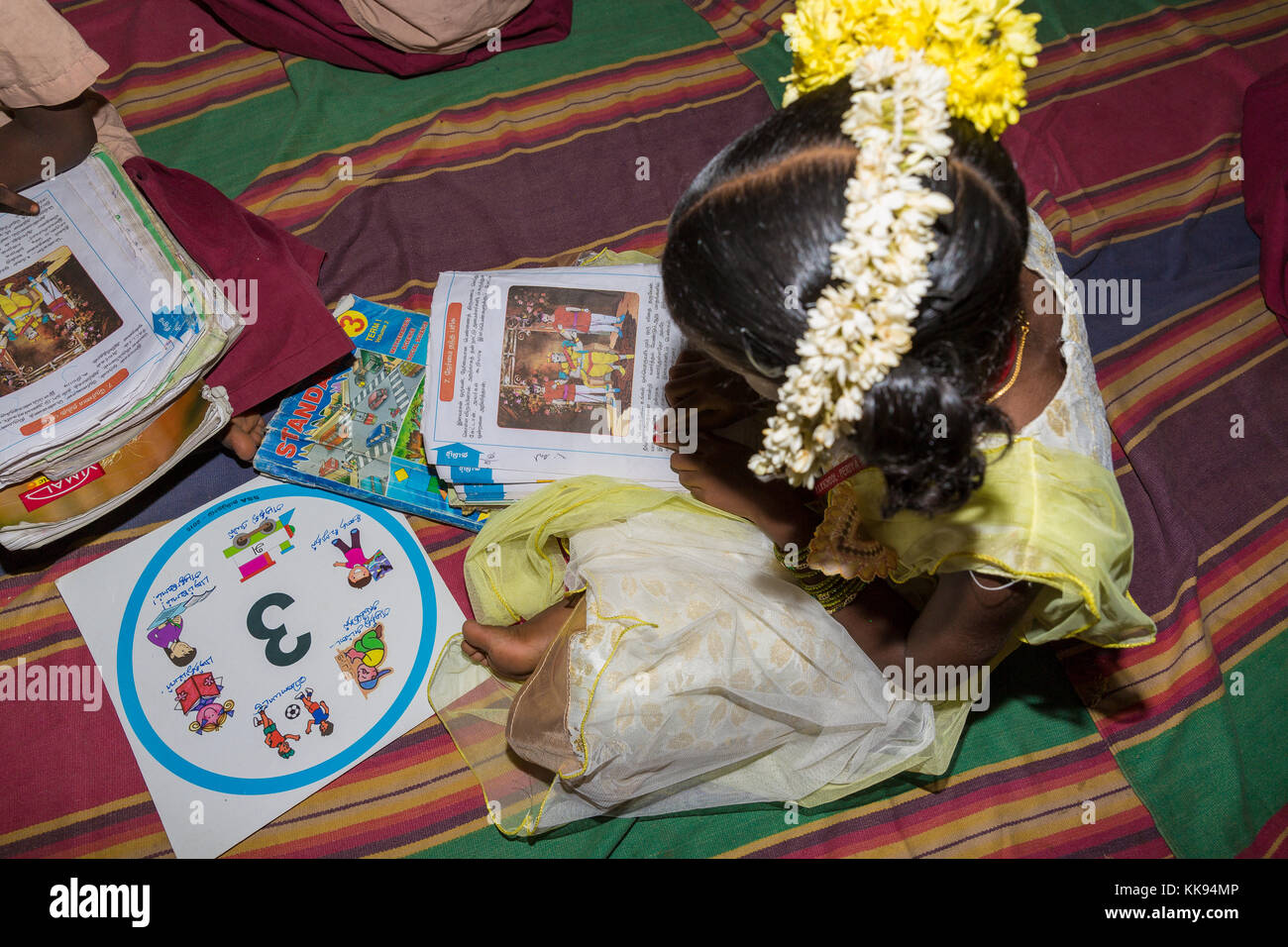 School children in classroom, with books and papers Stock Photo - Alamy
