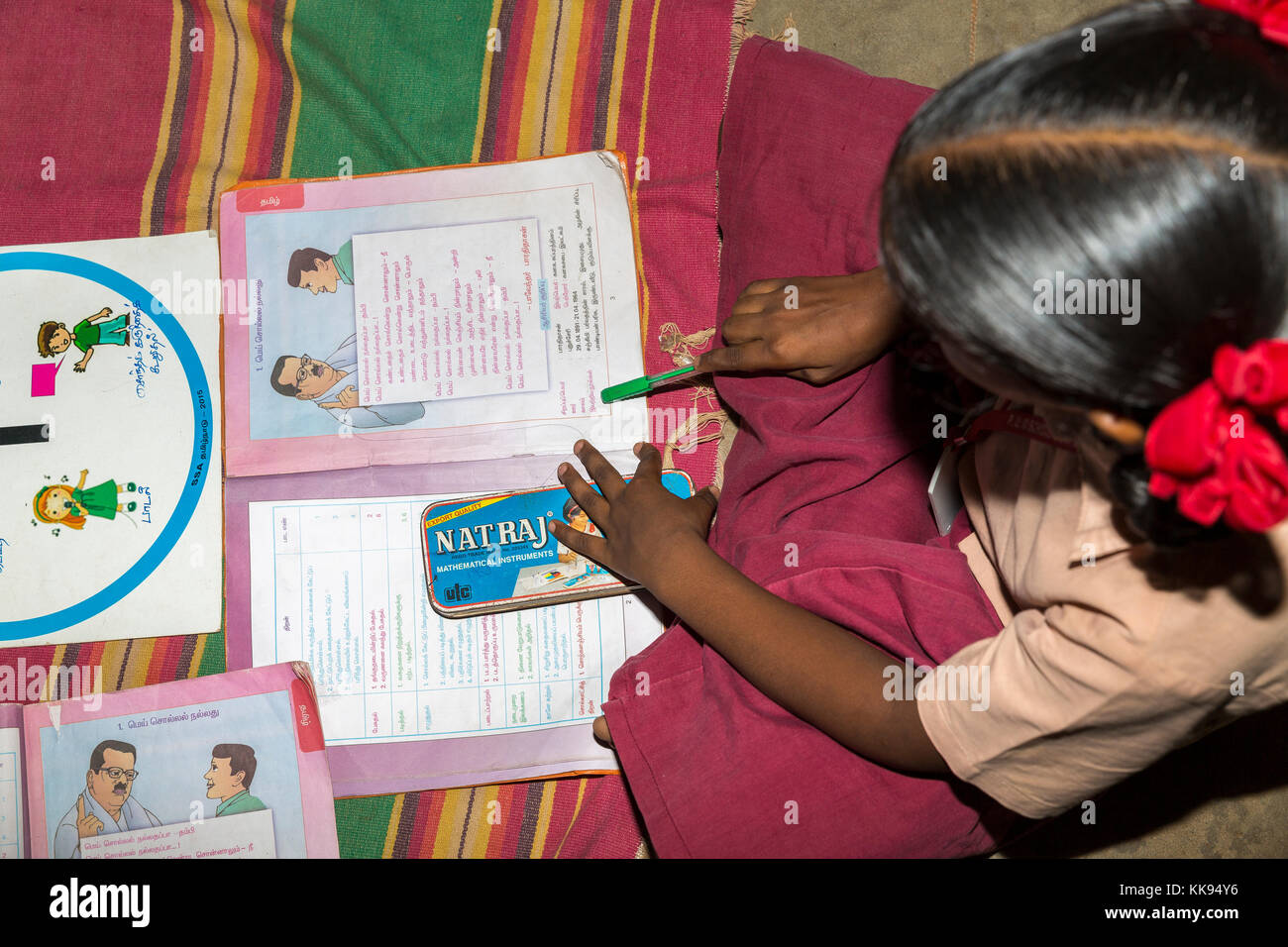School children in classroom, with books and papers Stock Photo - Alamy