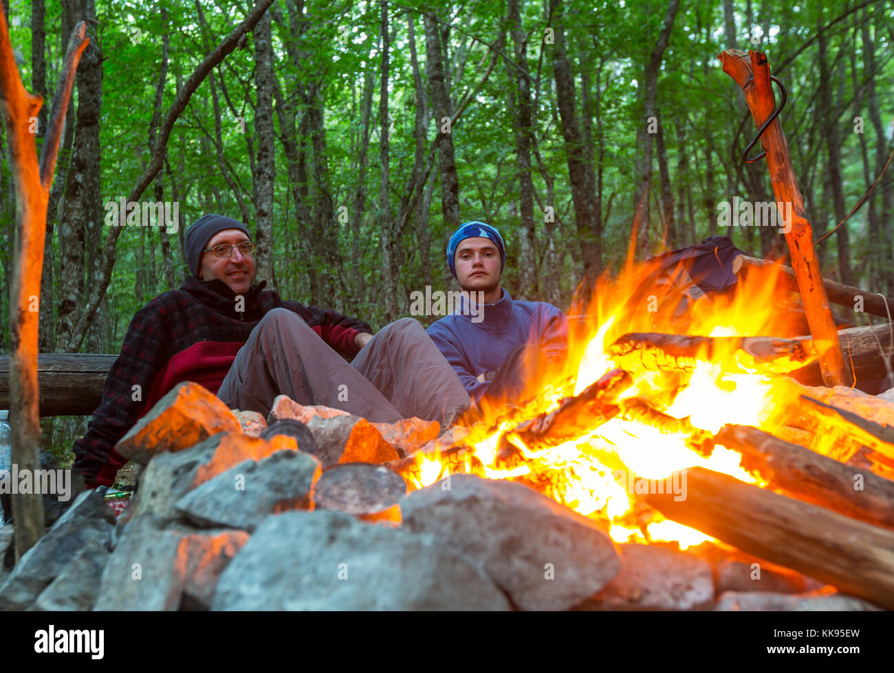 campfire in spring forest Stock Photo - Alamy