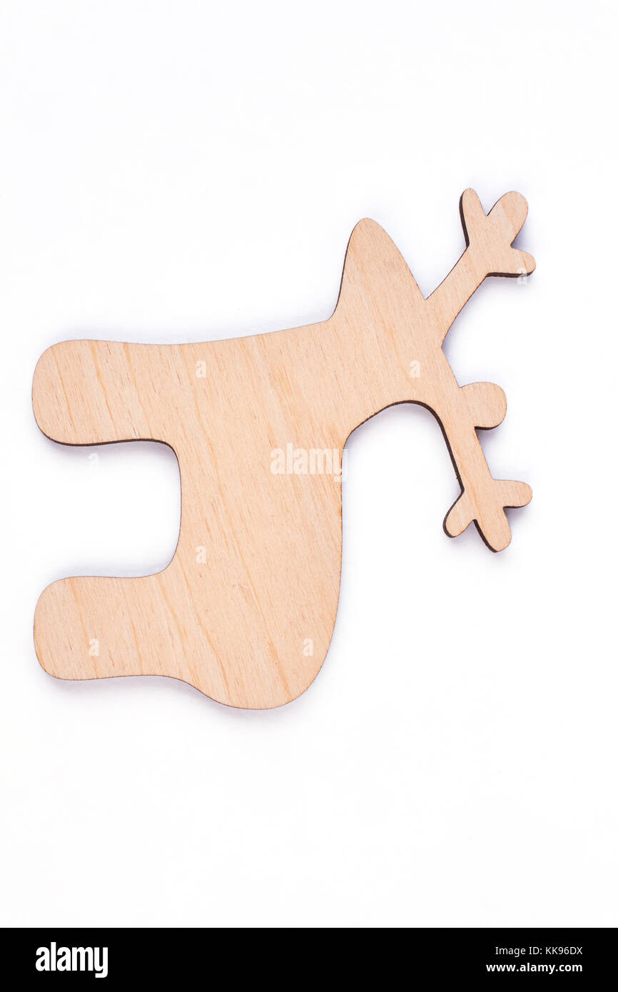 Cut out wooden figure of deer, white background Stock Photo - Alamy
