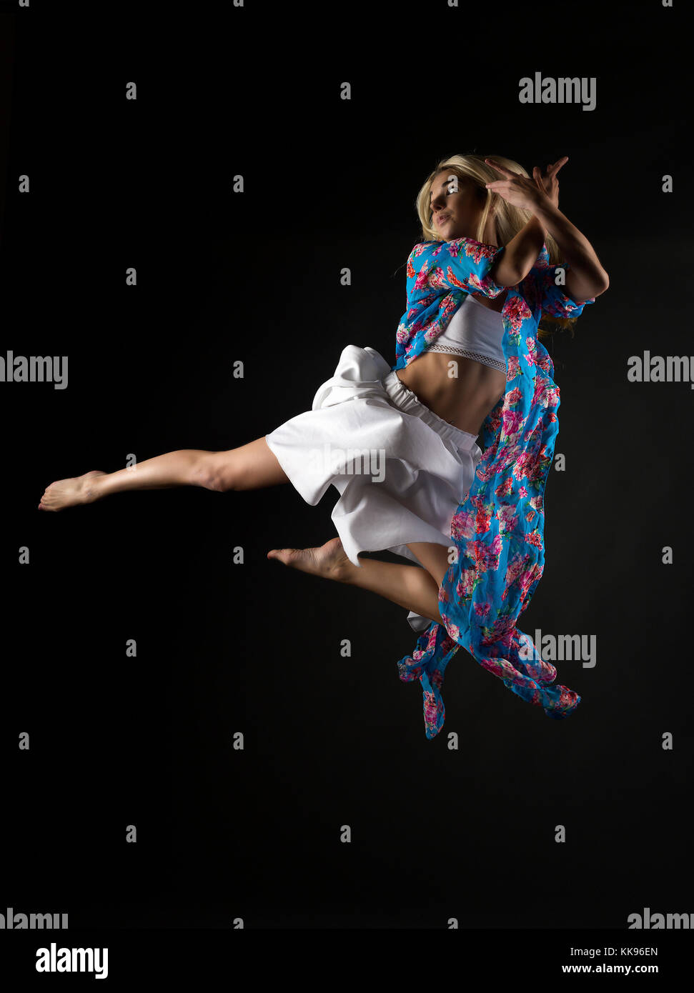 Studio dancing female mid air jumps Stock Photo - Alamy