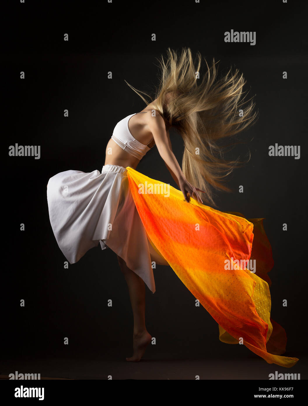 Studio dancing female mid air jumps Stock Photo - Alamy