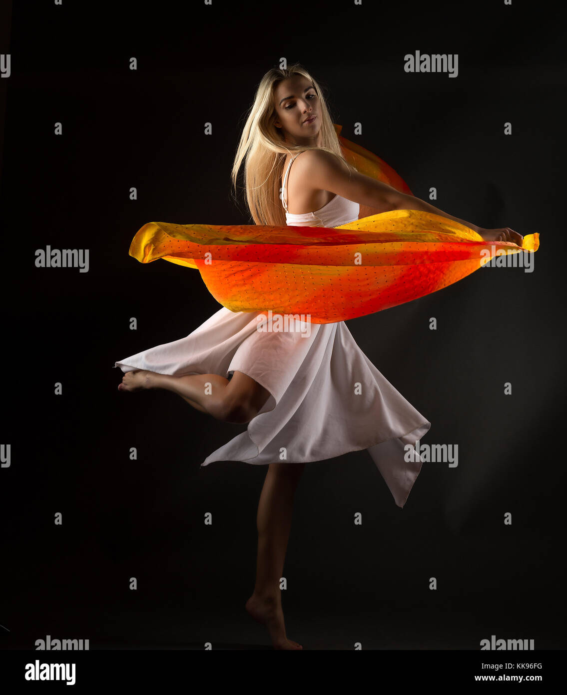 Studio dancing female mid air jumps Stock Photo - Alamy