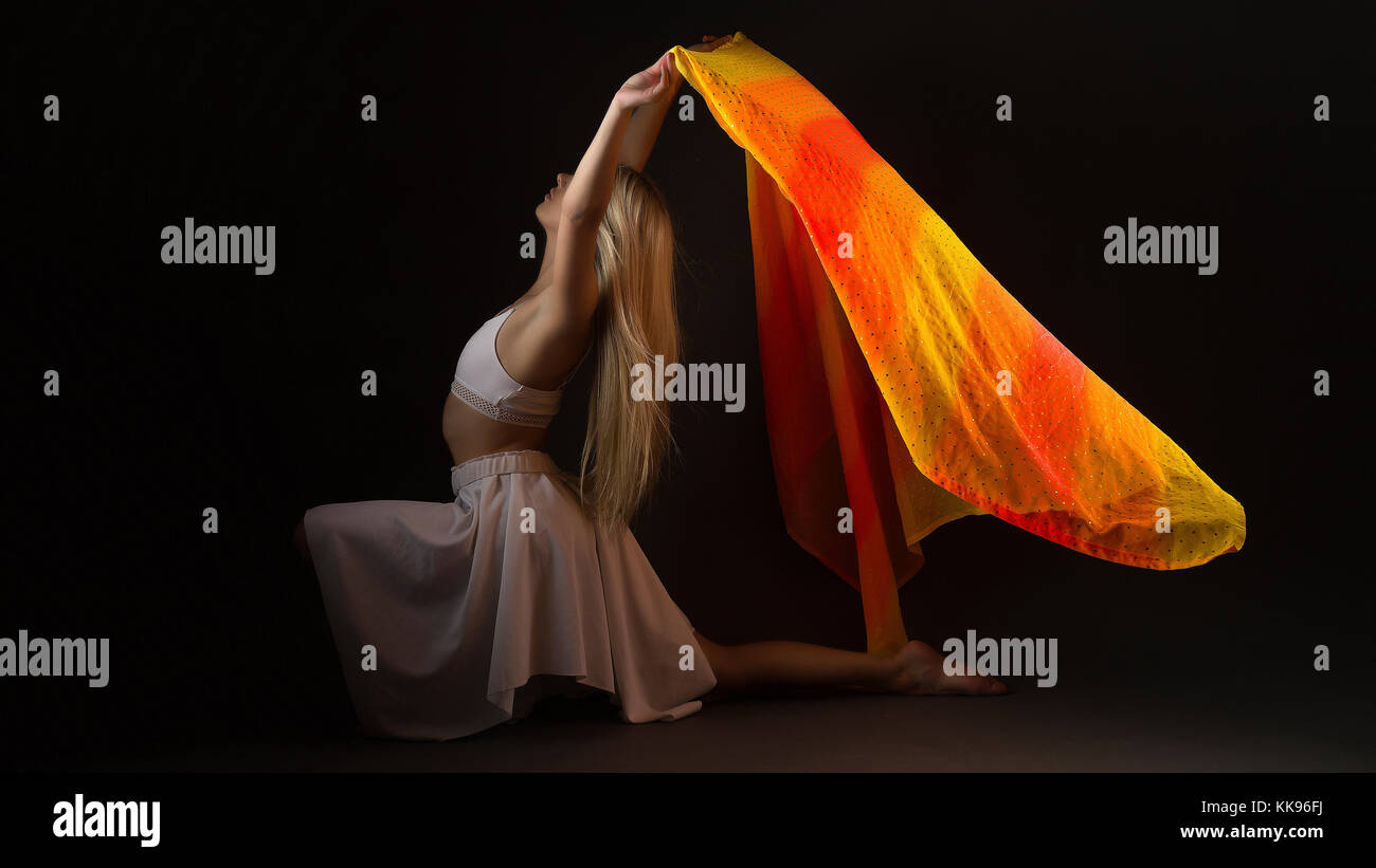 Studio dancing female mid air jumps Stock Photo - Alamy