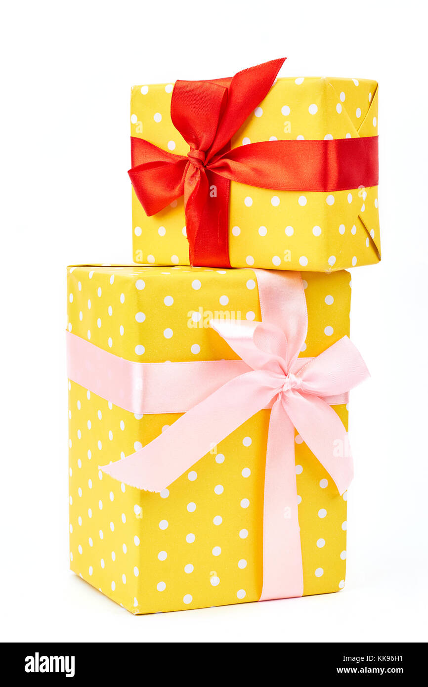 Two yellow dotted gift boxes Stock Photo - Alamy