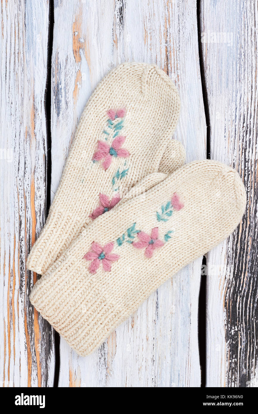 White female hand knitted mittens Stock Photo - Alamy