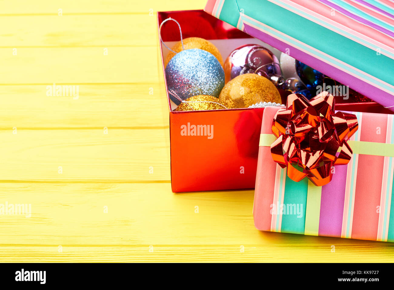 Colorful gift boxes with Christmas decorations Stock Photo - Alamy