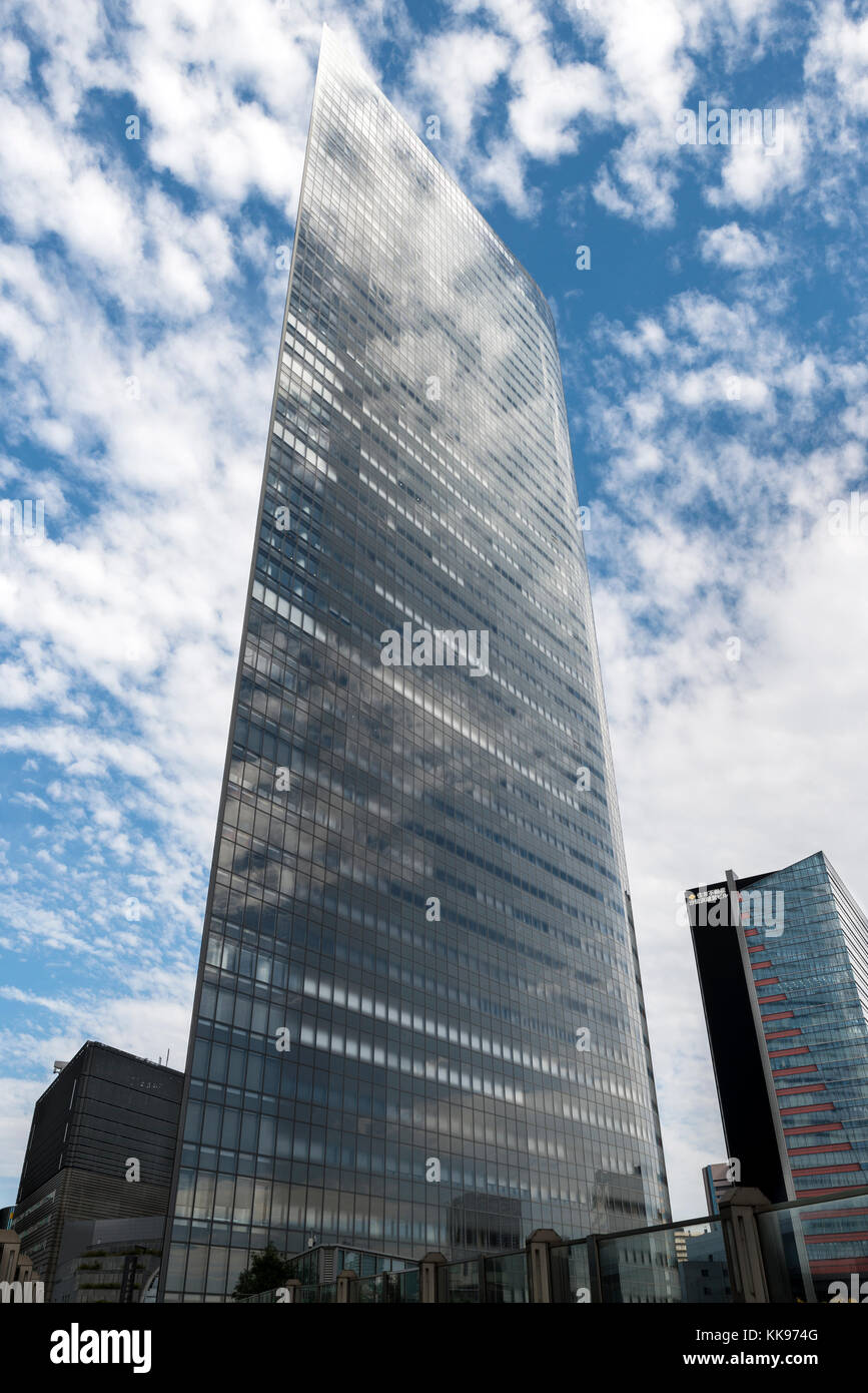 Dentsu Building with clouds, Shiodome, Tokyo, Japan Stock Photo - Alamy