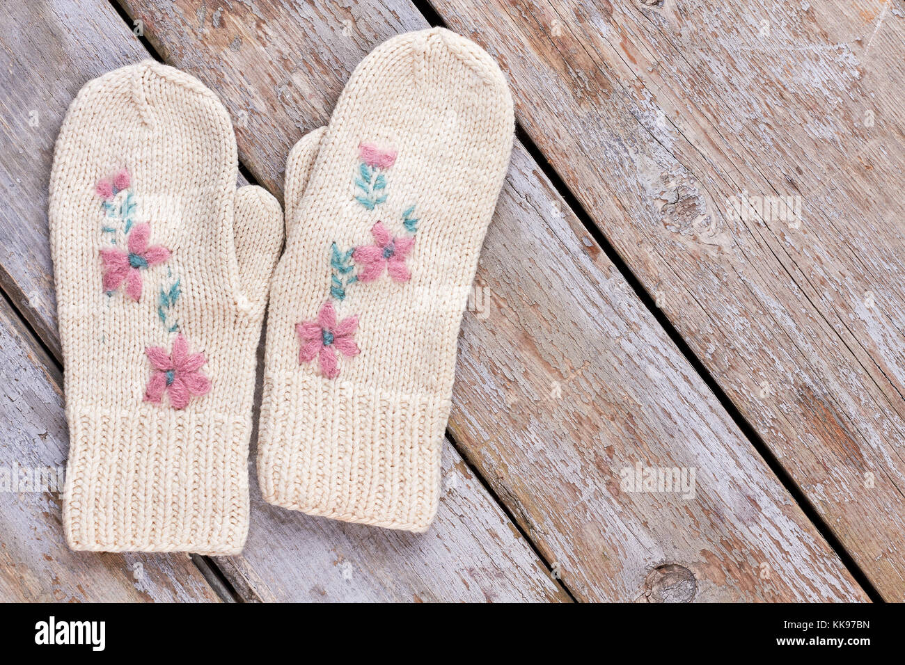 Female vintage style knitted mittens Stock Photo - Alamy