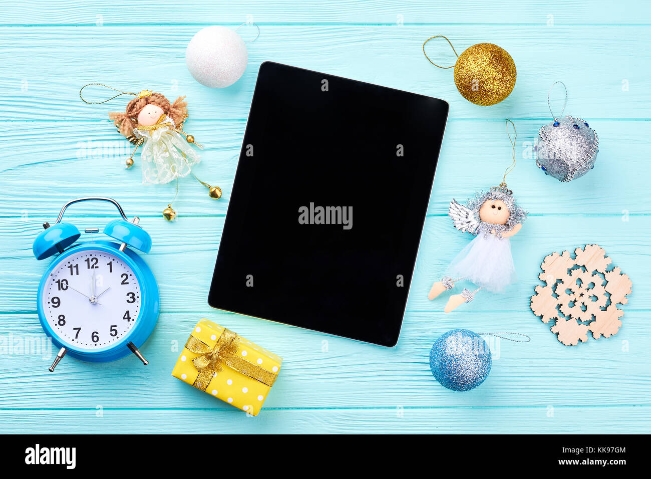 Computer tablet with Christmas ornaments Stock Photo - Alamy