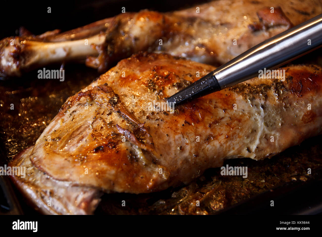 Delicious lamb in oven tray with pipette Stock Photo - Alamy