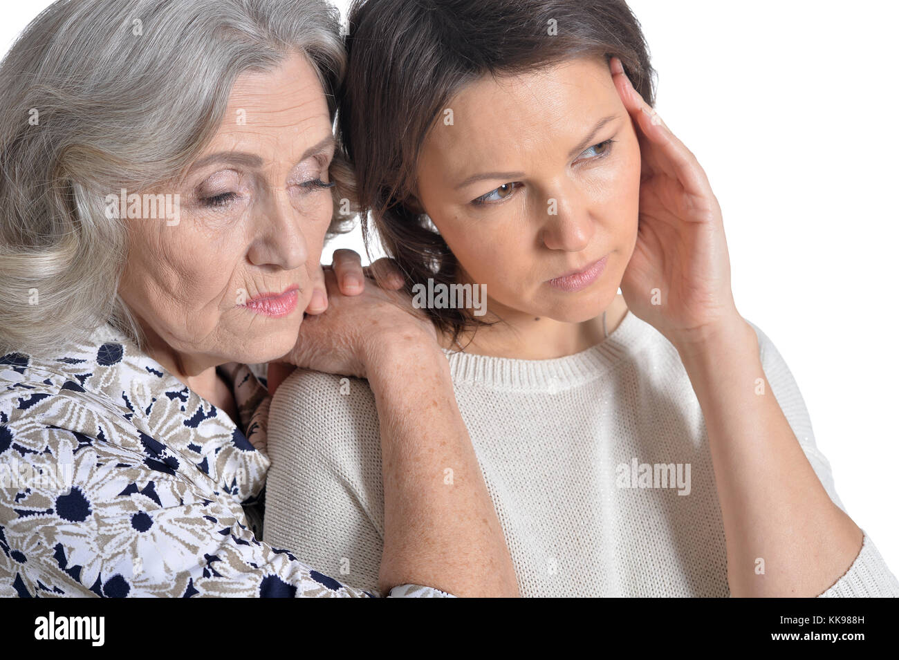 Sad senior and young woman Stock Photo - Alamy