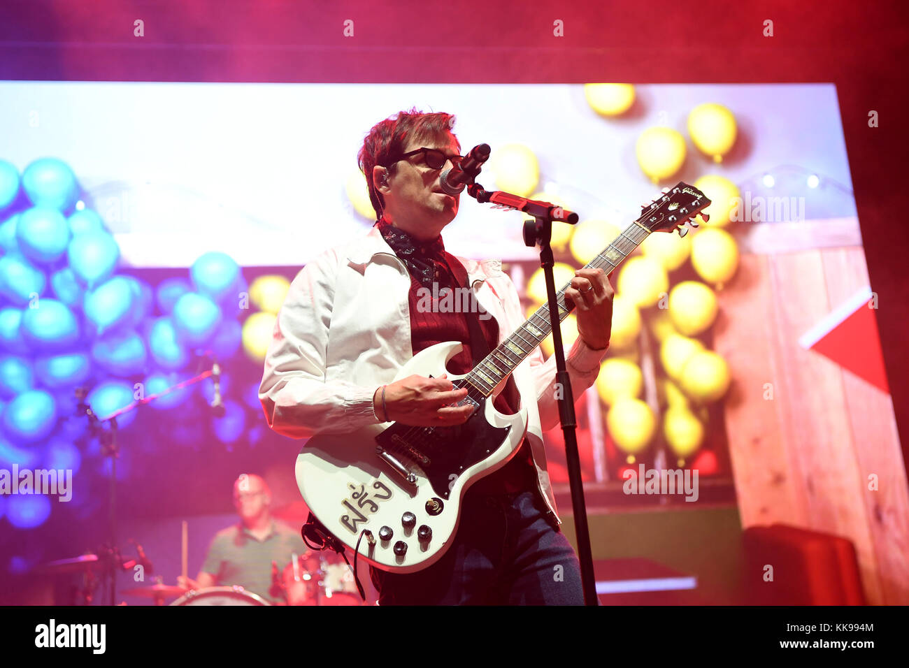 Weezer performing live on stage at Wembley Arena in London. Featuring ...