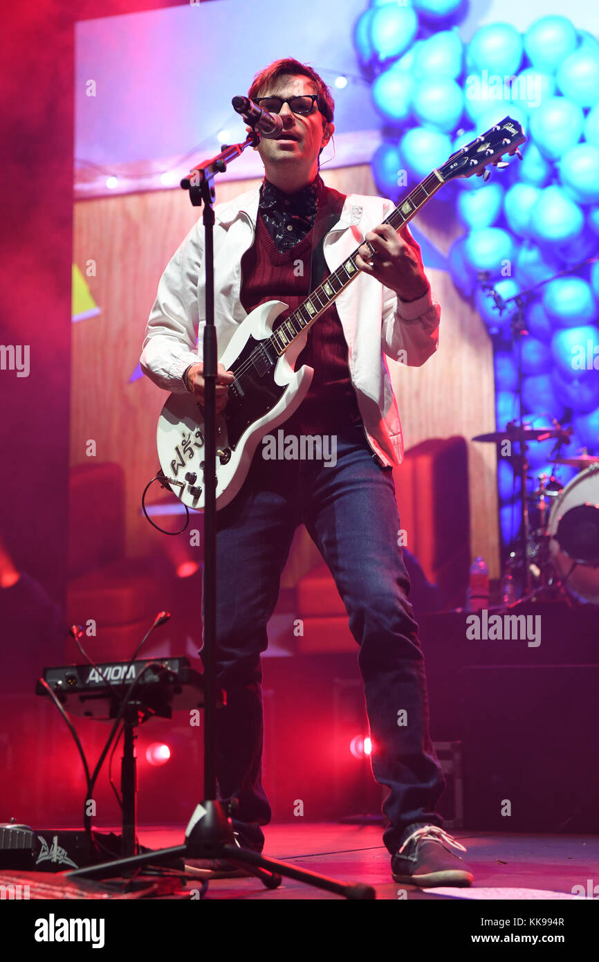 Weezer performing live on stage at Wembley Arena in London. Featuring ...