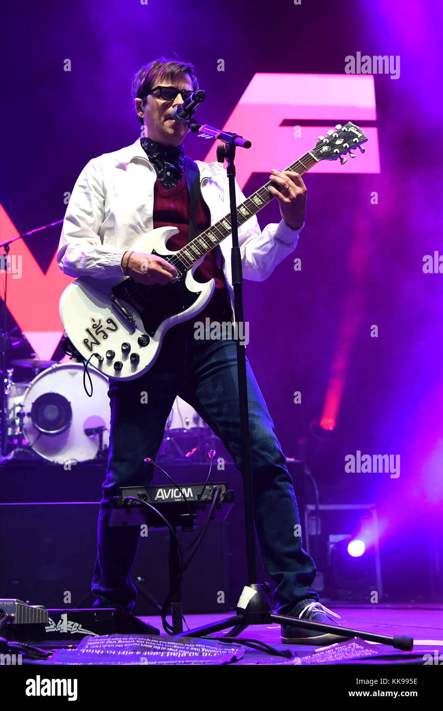 Weezer performing live on stage at Wembley Arena in London. Featuring ...