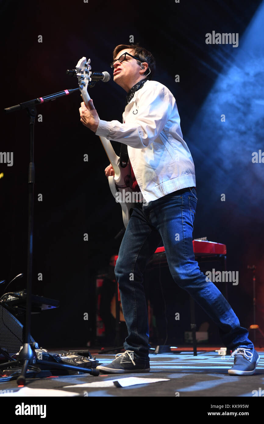 Weezer performing live on stage at Wembley Arena in London. Featuring ...