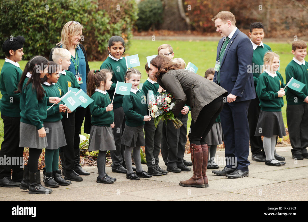 The Duchess of Cambridge speaks to pupils as she arrives at the Robin ...