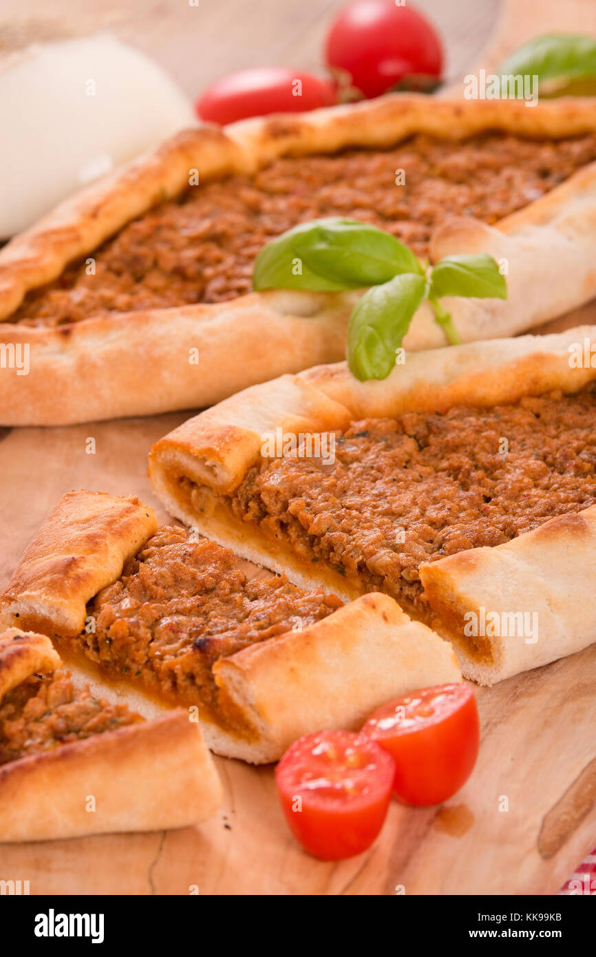 Turkish pide pizza with meat and onion Stock Photo - Alamy