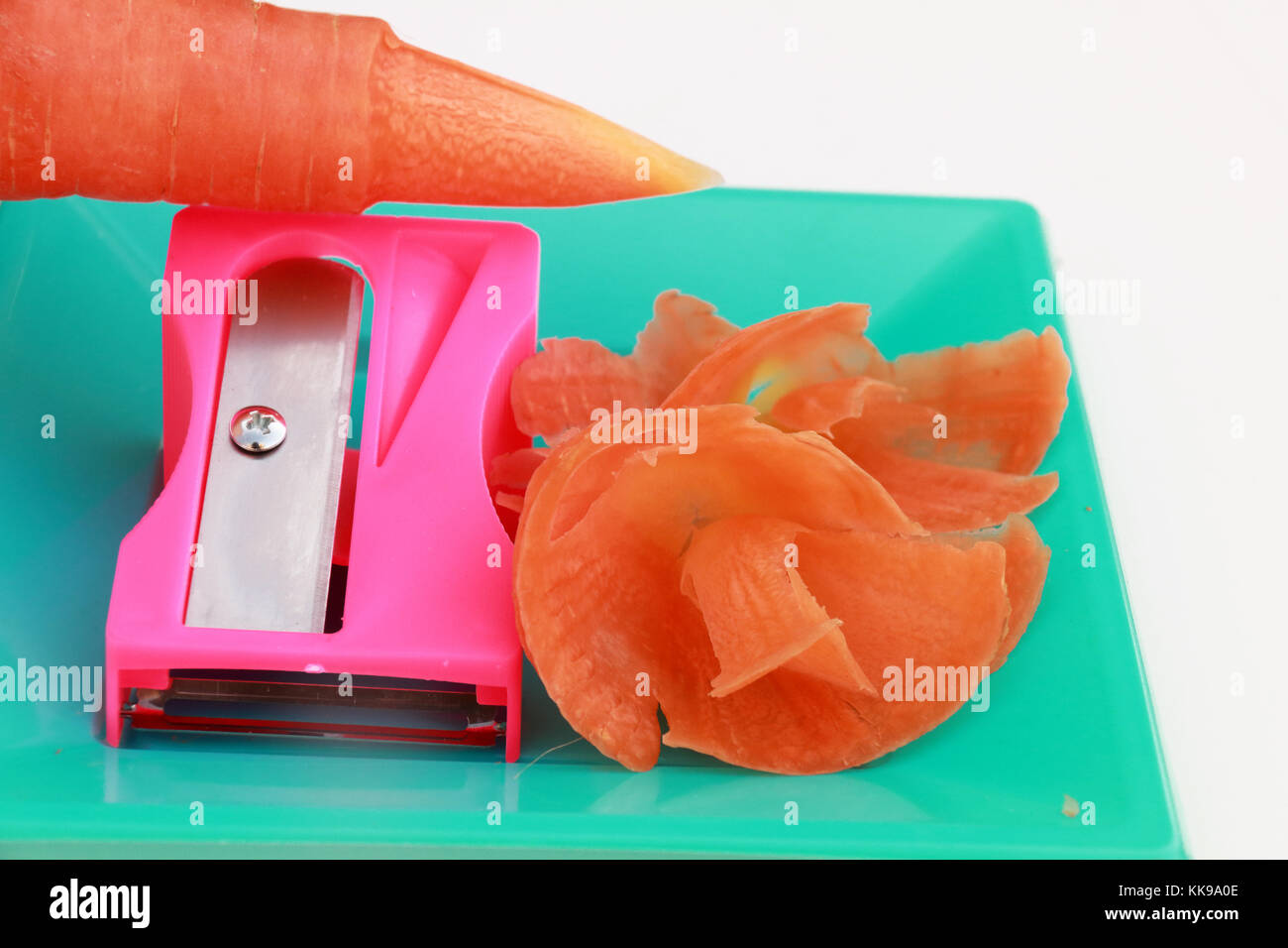 Carrot shavings made with a pencil sharpener Stock Photo - Alamy