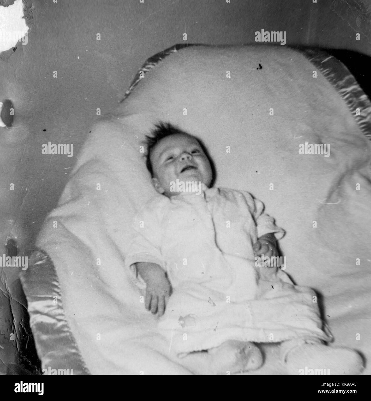 Vernacular snapshot photograph of infant and blanket, 1952 Stock Photo ...