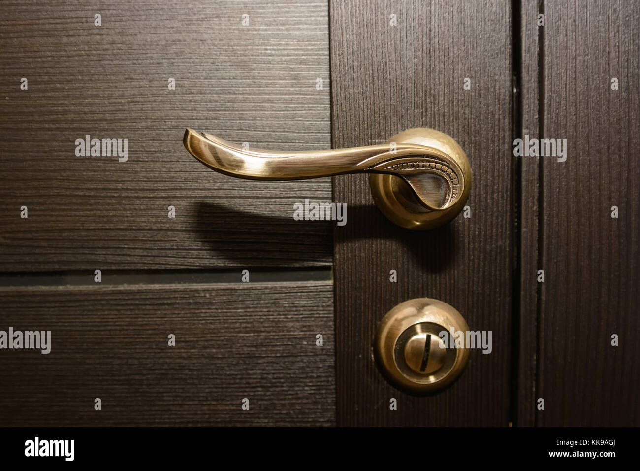 Closeup of metal bronze doorhandle Stock Photo - Alamy
