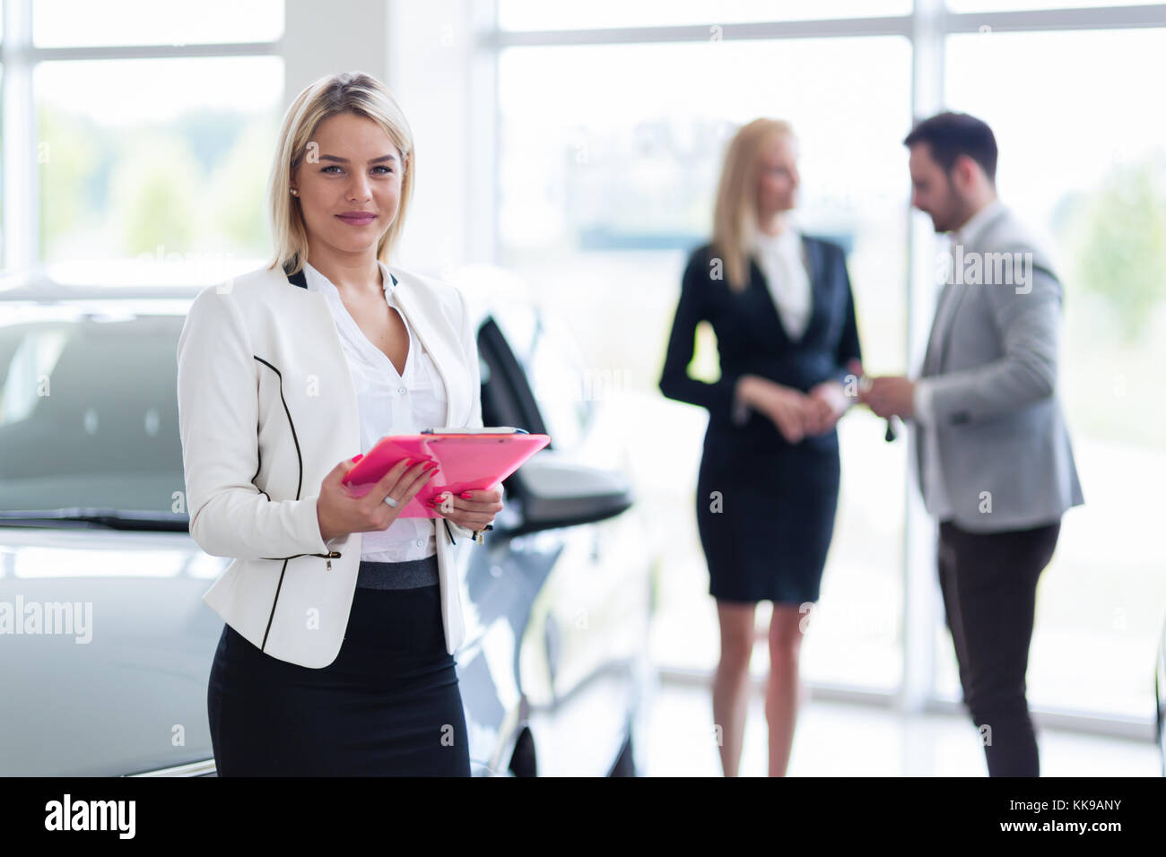 Picture of professional salesperson working in car dealership Stock ...