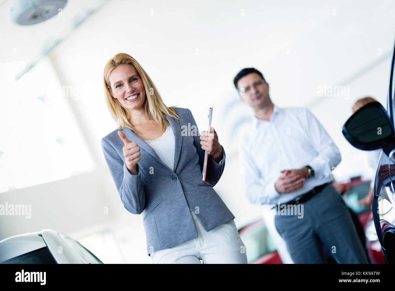 Picture of professional salesperson working in car dealership Stock ...
