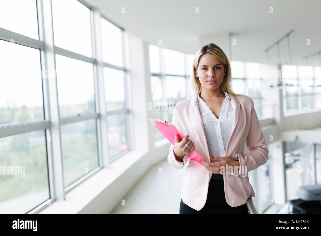 Picture of professional salesperson working in car dealership Stock ...